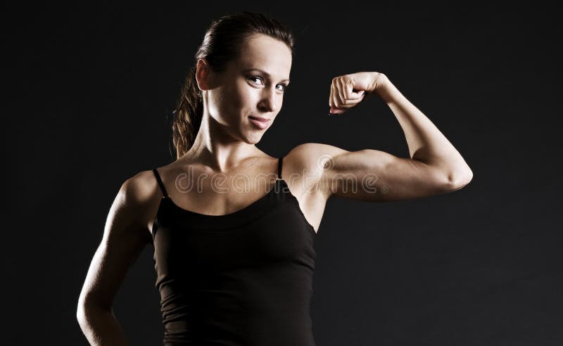 Muscular Woman with Slim Fitness Body Doing Exercises with Dumbbell on ...