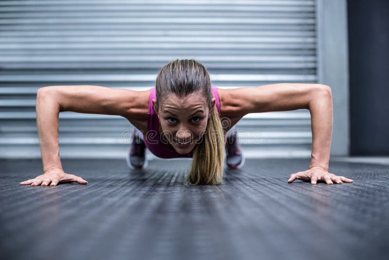 Muscular Woman Doing Push Ups Stock Photo - Image of care, lifestyle ...
