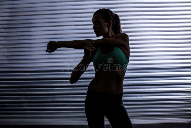 Muscular Woman Stretching Shadow Room Stock Photos - Free & Royalty ...
