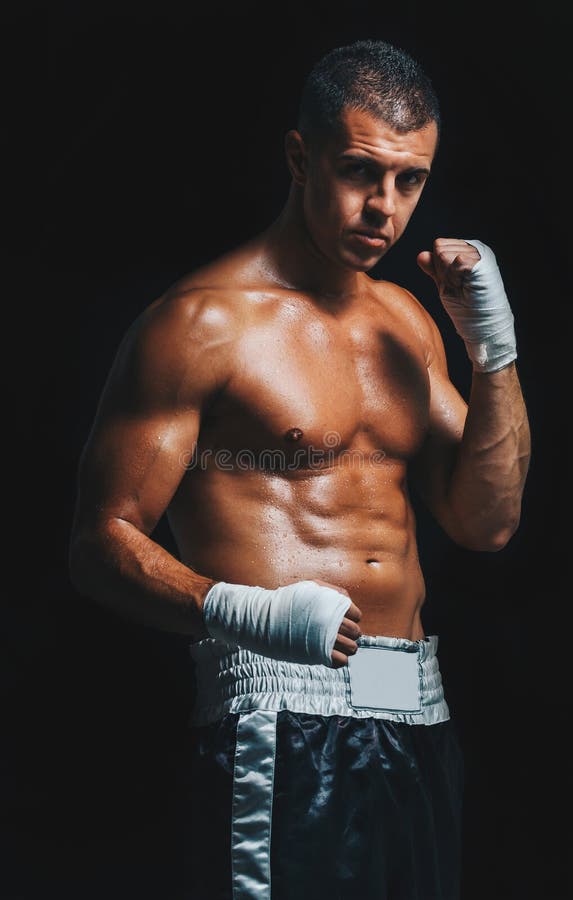 Muscular Young Man Boxer Wrapping Hand with Bandage. Fighter Man ...