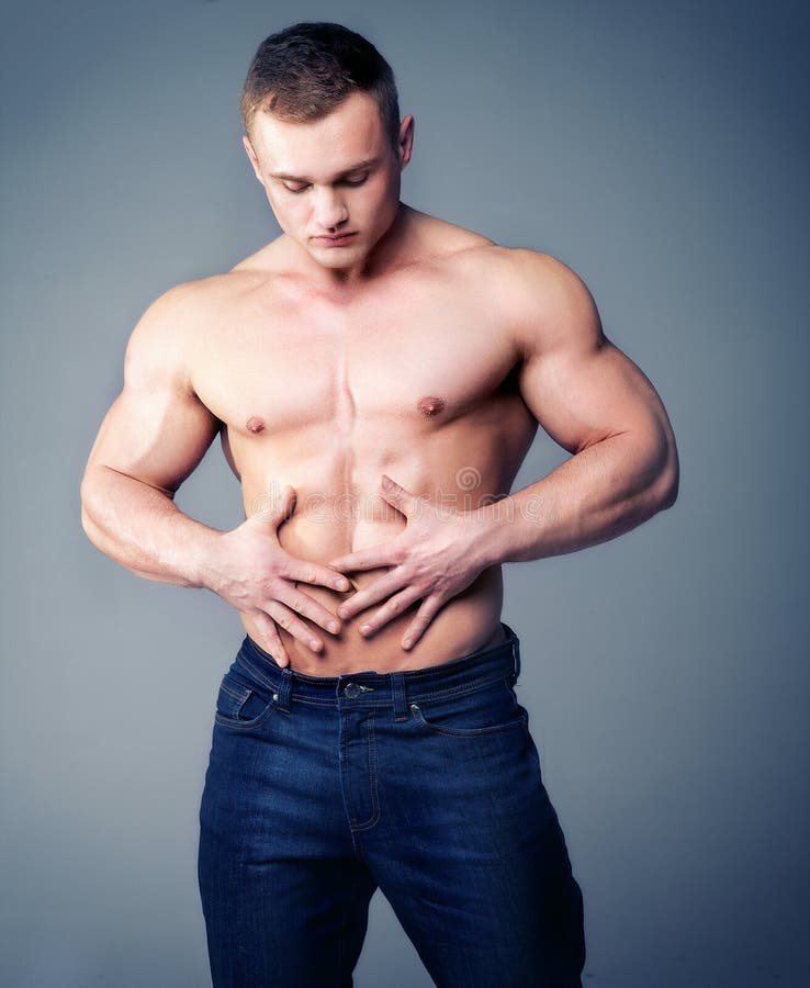 Muscular Young Man in Jeans. Stock Image - Image of fashion, macho ...