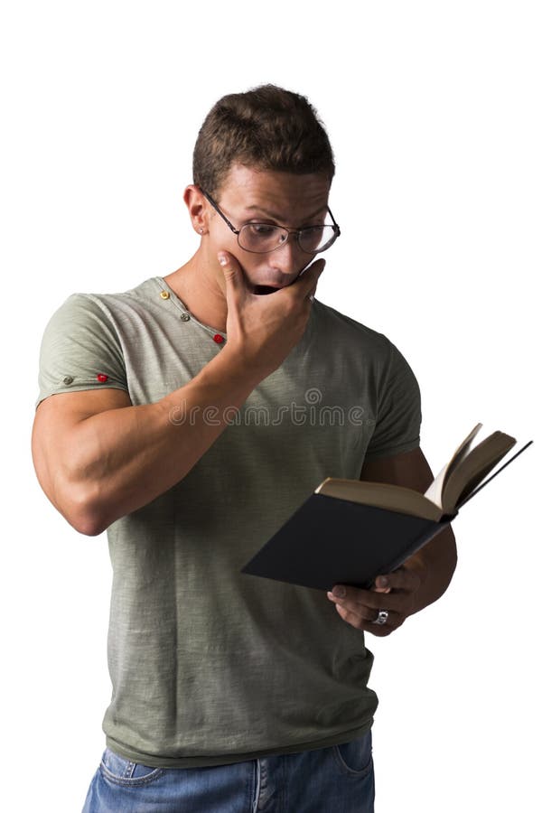 Muscular Young Man Standing Reading Book with Surprised Expression ...