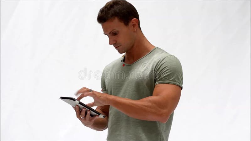 Muscular Young Man Exercising Biceps with Dumbbells Stock Footage ...
