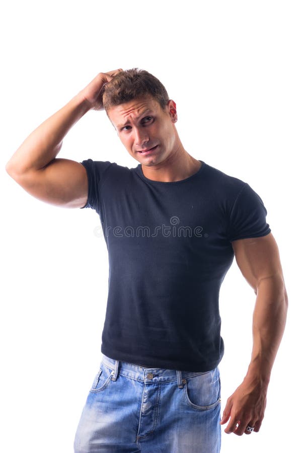 Confused Or Doubtful Young Man Scratching His Head And Looking Up Stock