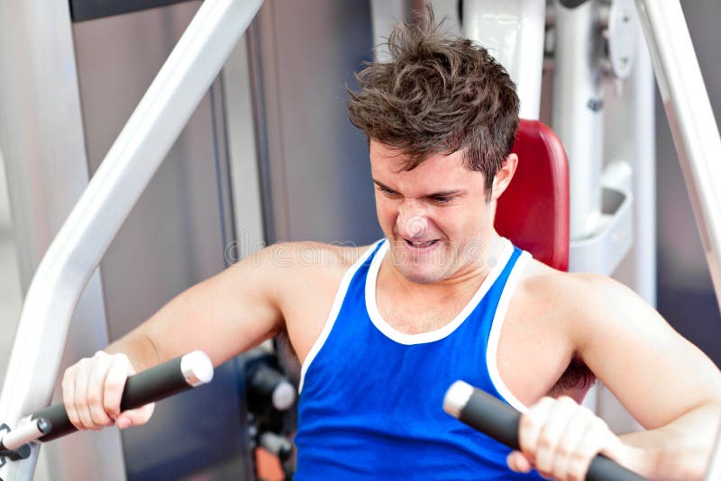 Muscular Young Man Using a Bench Press Stock Image - Image of healthy ...