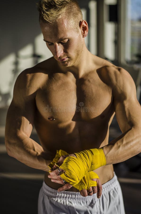 Muscular Young Man Wrapping Bandage Around His Hands Stock Image ...