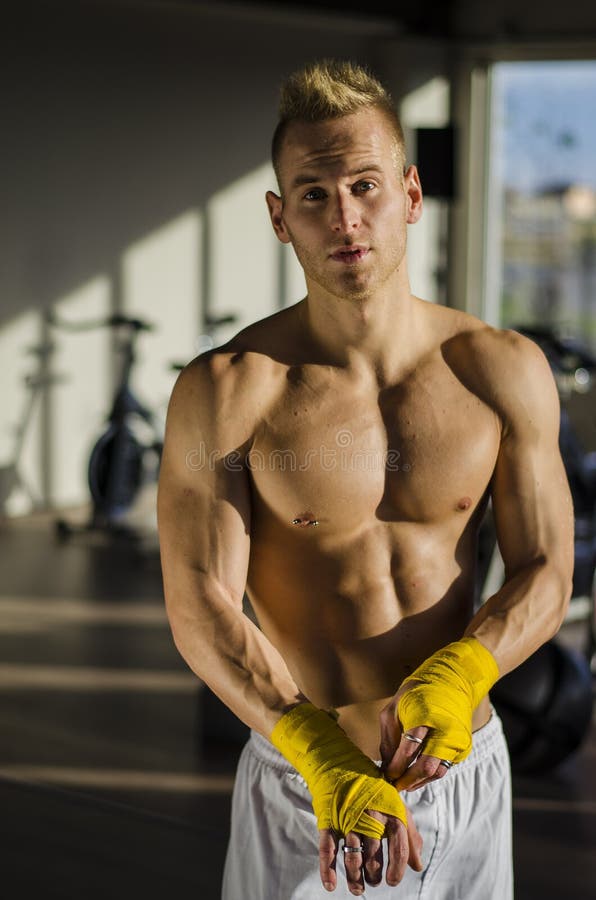 Muscular Young Man Wrapping Bandage Around His Hands Stock Image ...