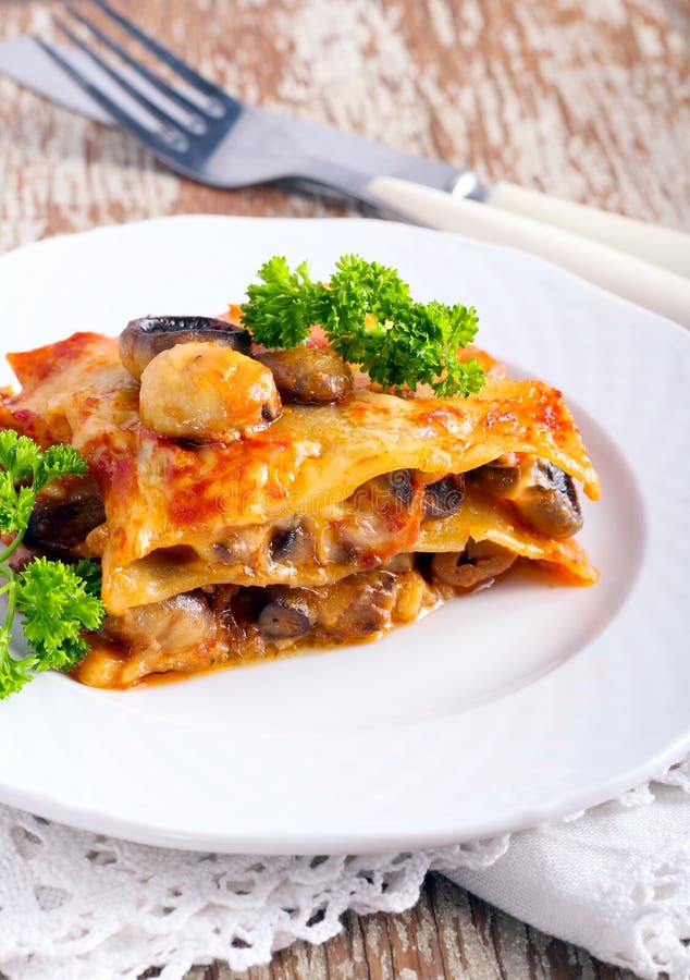 Mushroom lasagna on plate stock image. Image of appetizer - 35451093