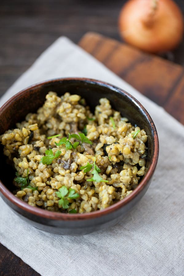 Mushrooms risotto stock image. Image of dinner, thyme - 78271495