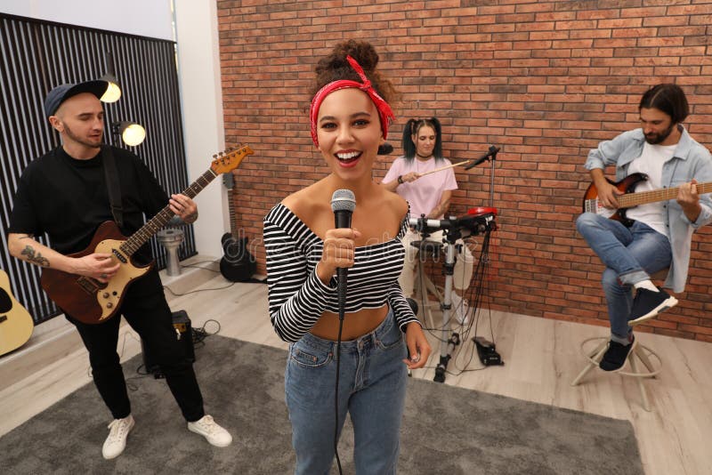 Music Band Performing in Modern Recording Studio Stock Photo - Image of ...