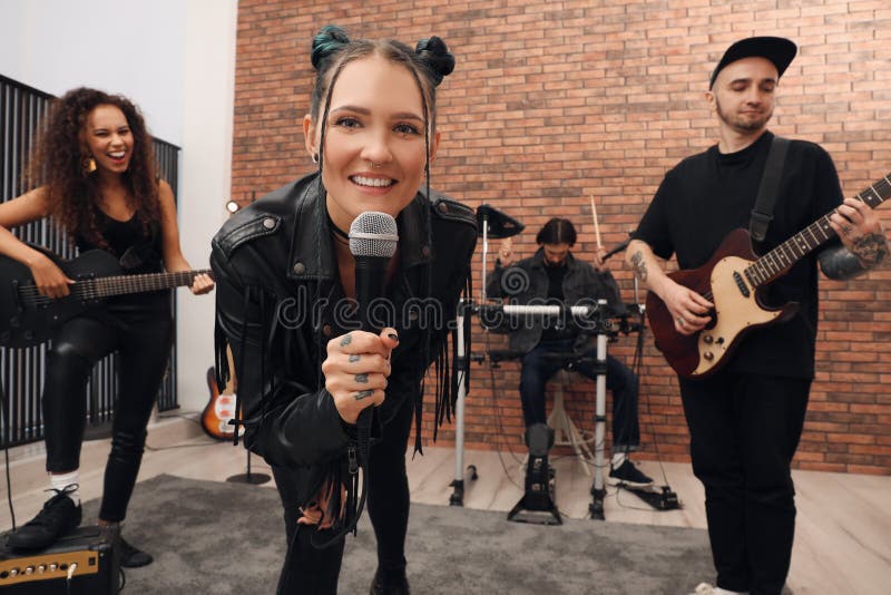 Music Band Performing in Modern Recording Studio Stock Photo - Image of ...