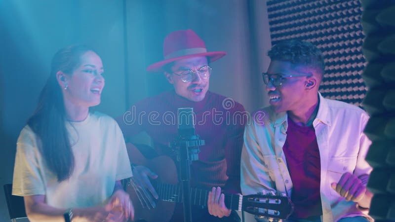 Music Band is Singing in the Studio and Getting Recorded Stock Footage ...