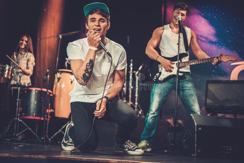 Music band on a stage stock photo. Image of rehearsing - 59011760