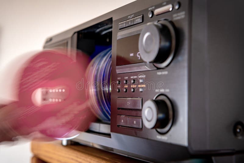 Music CD Insertion into a Music Player Stock Photo - Image of blur ...