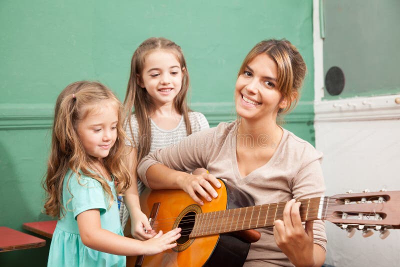 Music Class in the Kindergarden Stock Photo - Image of adult, class ...