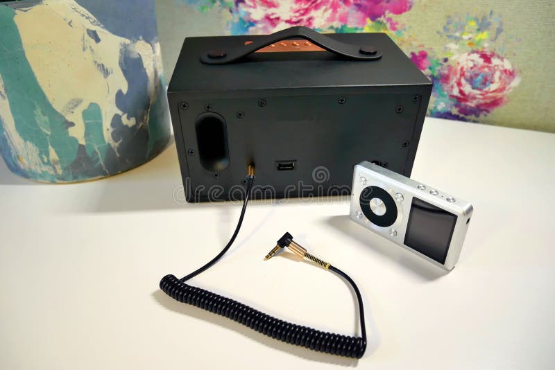 A Music Column in a Wooden Case. Wireless Speaker in Black Stock Image ...