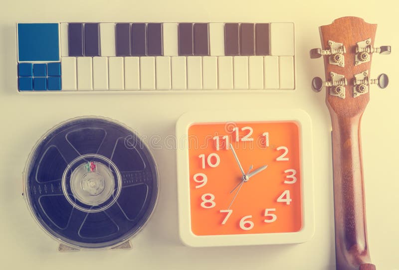 Music Equipment with Orange Clock Stock Image - Image of guitar ...
