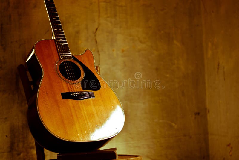 Classical Guitar, between Light and Shadow Stock Photo - Image of book ...