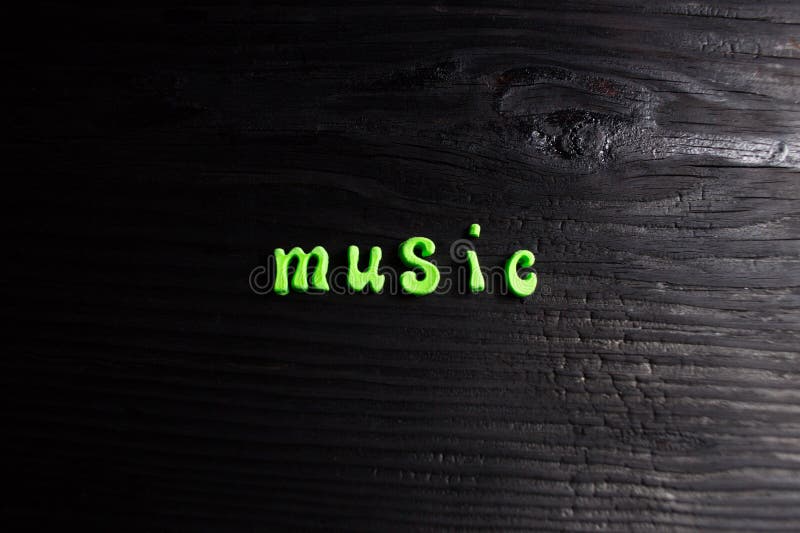 Music. the Green Word Music on a Dark Background Stock Image - Image of ...