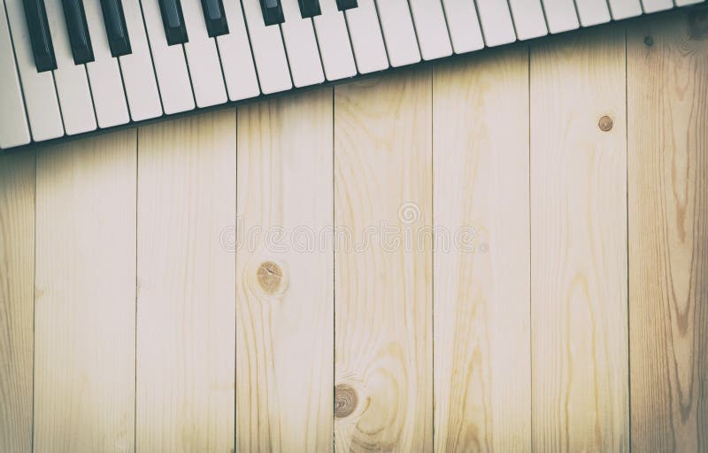 Music Keyboard on Wooden Texture Table for Background Stock Photo ...