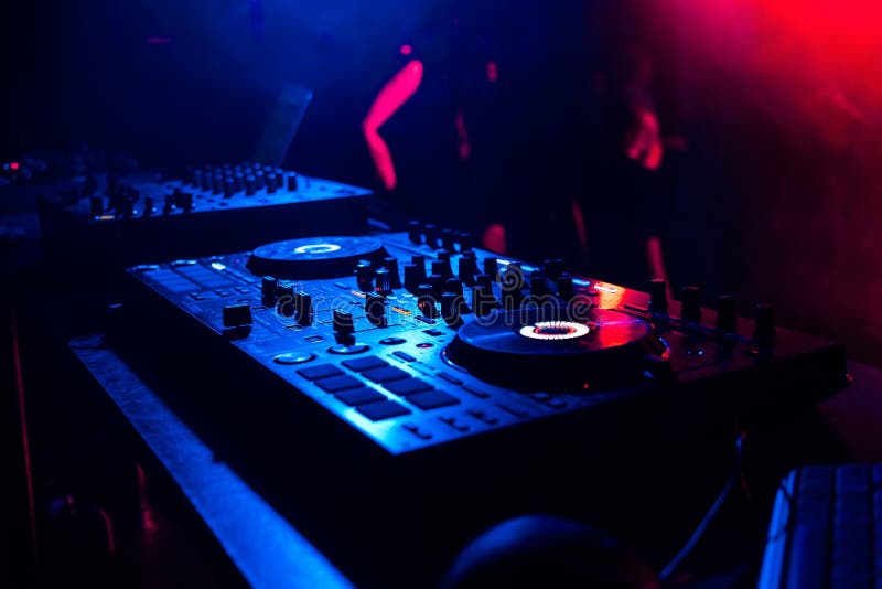 Music Mixer Controller Music Control DJ Under the Light of Spotlights ...