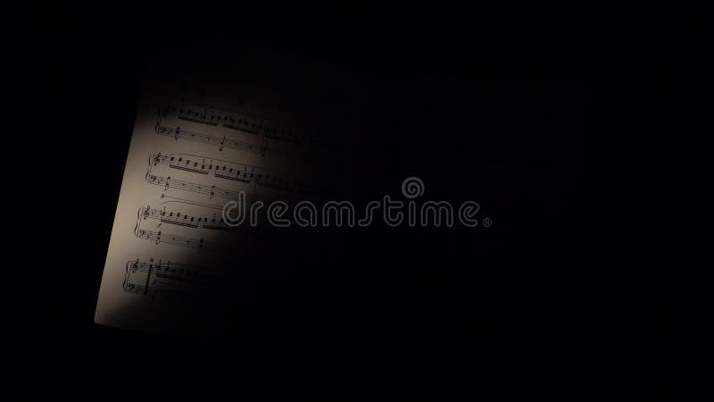 Music Notes with Ray of Light on Black Stock Footage - Video of ...