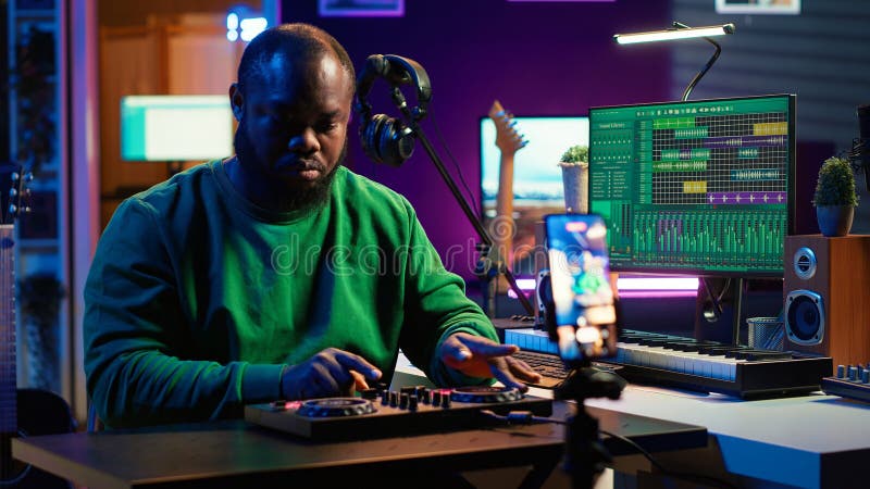 Music Producer Explaining Faders and Knobs on Mixing Console before ...