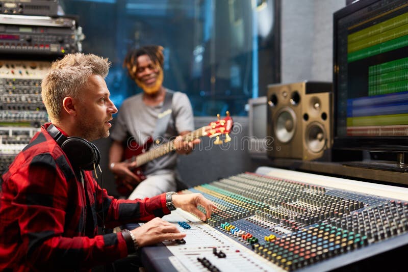 Recording music stock photo. Image of headphones, adult - 77604580