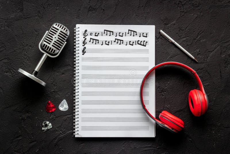 Music Sheets with Musical Notes and Microphone, Top View Stock Photo ...