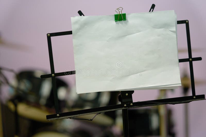 Music Stand with Mock Up Notes Paper on Blur Drum Background Stock ...