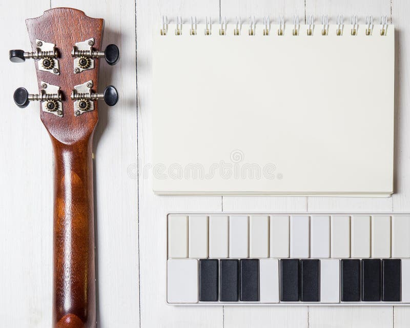 Writing Equipments and Computer Tools Plus Graphic Picture Placed on a ...