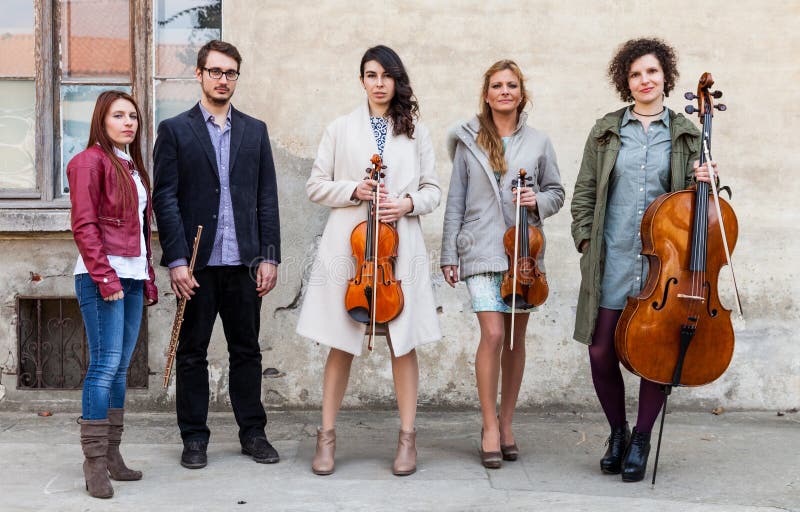 Four-person musical band stock image. Image of long - 107489505