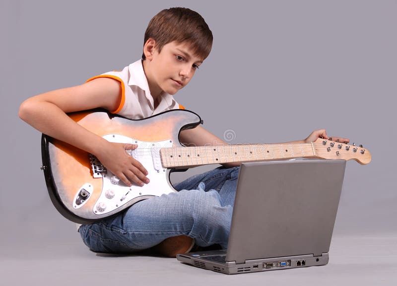 The musical boy stock photo. Image of laptop, music, play - 22147672
