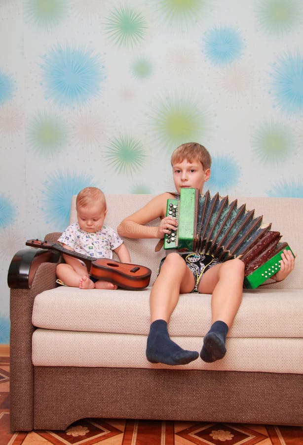 Musical Ensemble of Two Brothers Stock Photo - Image of brother ...