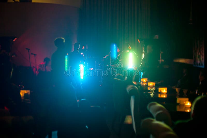 The Musical Group Acts in a Dark Restaurant Stock Photo - Image of ...