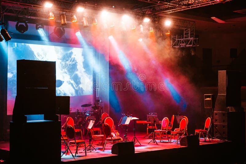 Musical Instruments, Chairs and Bright Spotlights on an Empty Stage ...