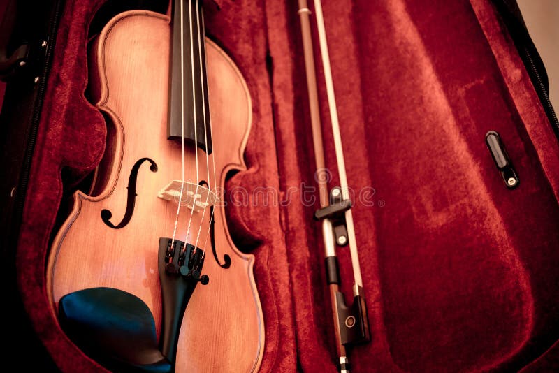 Musical Instruments. Close Up Violin and Bow in Open Dark Red Case ...
