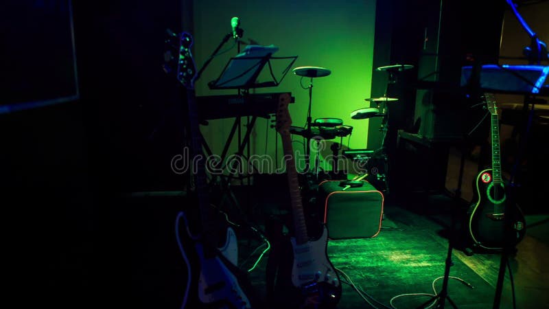 Musical Instruments on Night Bar Stage Under Light Flashes Stock Video ...