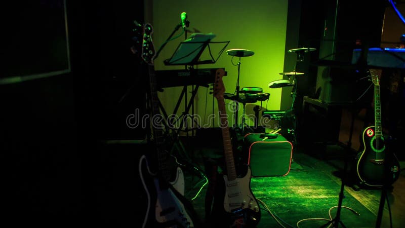 Musical Instruments on Night Bar Stage Under Light Flashes Stock Video ...