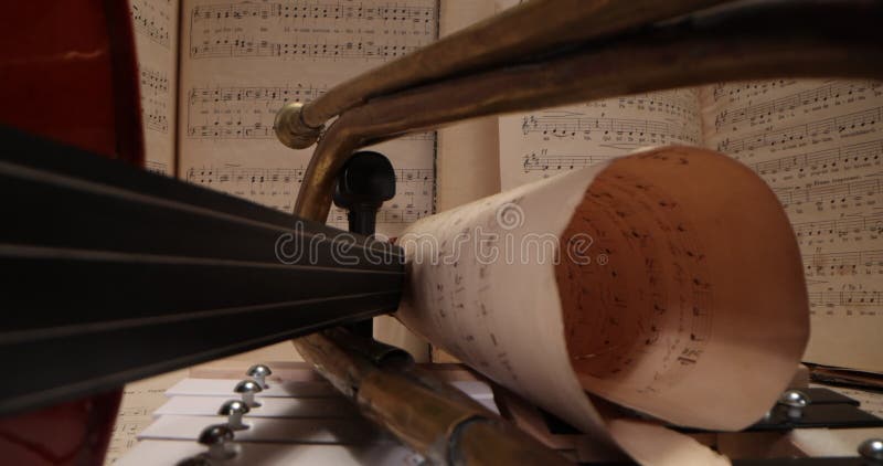 Musical Instruments with Sheet Music on Table. Music, Musical ...