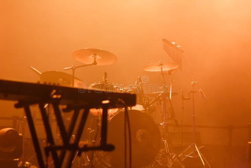 Musical Instruments on the Stage Filled with Orange Light Stock Photo ...
