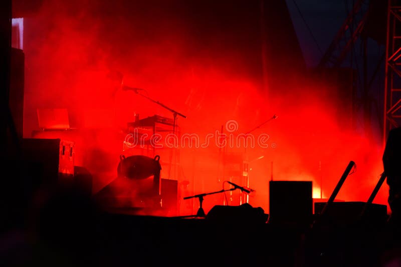Musical Instruments on the Stage in Red Lights Stock Photo - Image of ...