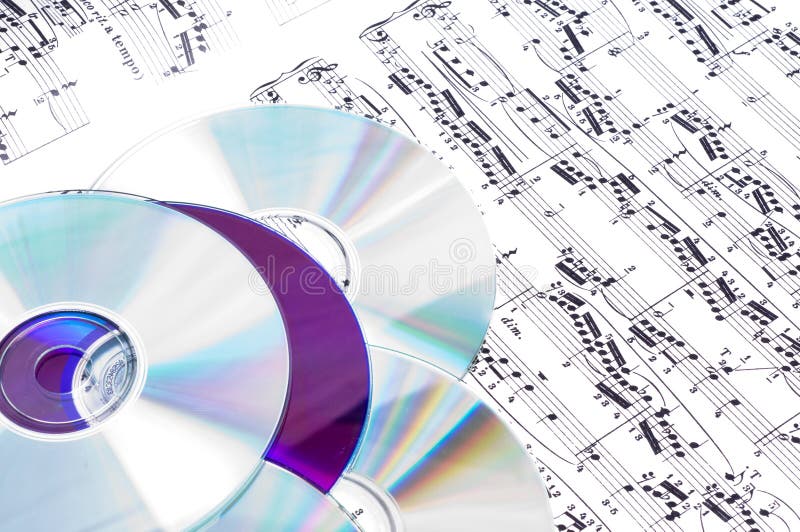 Audio CD and music notes stock image. Image of record - 4386417