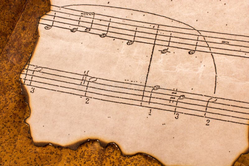 Musical Notes on Burnt Paper Placed Leaf Stock Photo - Image of ...