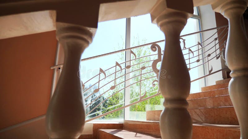 Musical Notes Cascading Down a Staircase. Staircase Adorned with ...