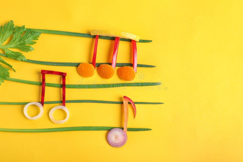 Musical Notes Made of Vegetables and Fruits on Color Background, Top ...
