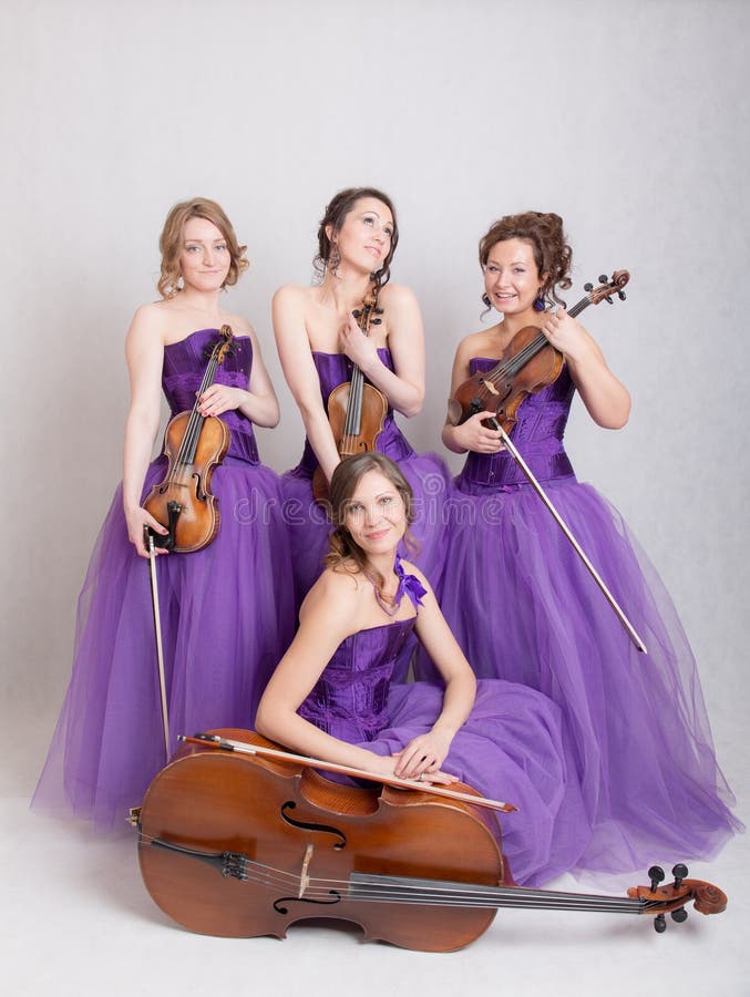 Musical Quartet in Evening Dresses Stock Photo - Image of gown, beauty ...