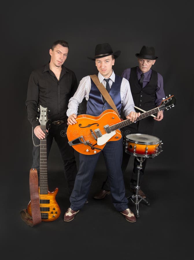 Trio with instruments stock photo. Image of studio, girls - 54524468