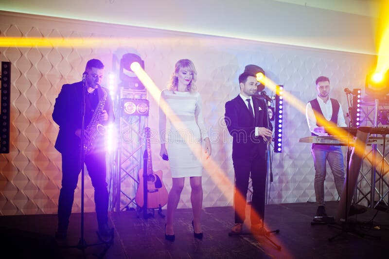 Musicial Music Live Band Performing on a Stage Stock Image - Image of ...