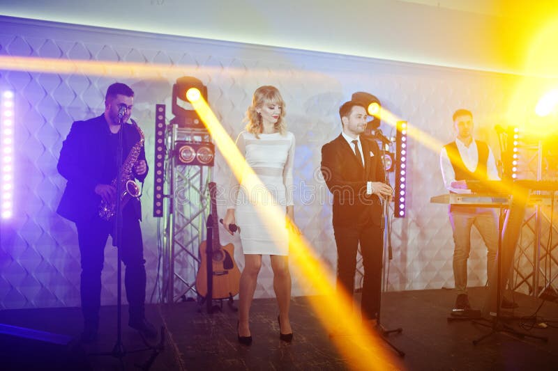 Musicial Music Live Band Performing on a Stage Stock Image - Image of ...